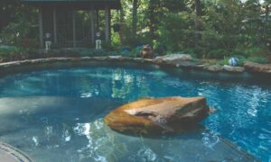 Lagoon Pools: Design Ideas, Pros/Cons & More - Pool Research